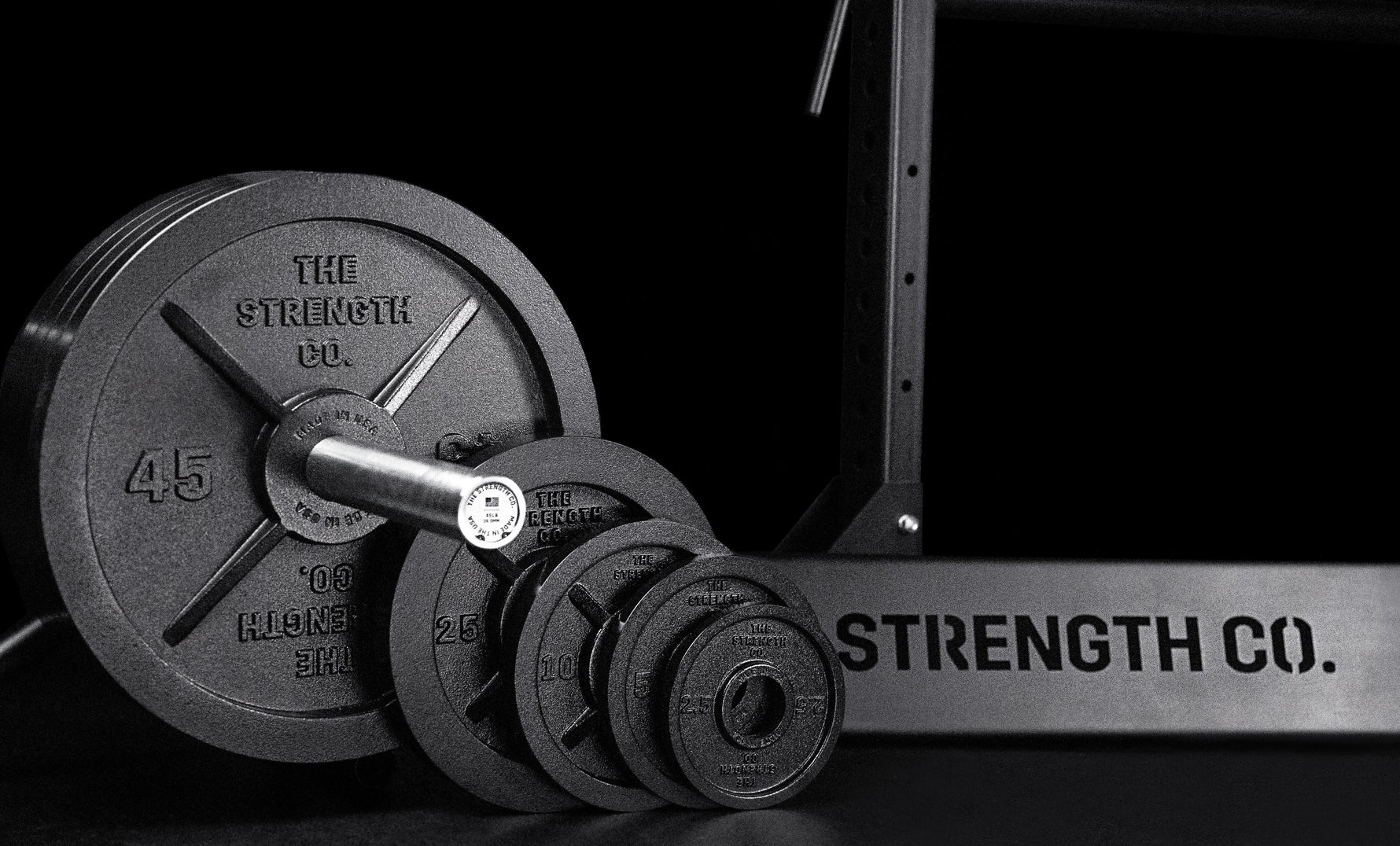 Olympic Barbell Plates & USA Gym Equipment - The Strength Co.
